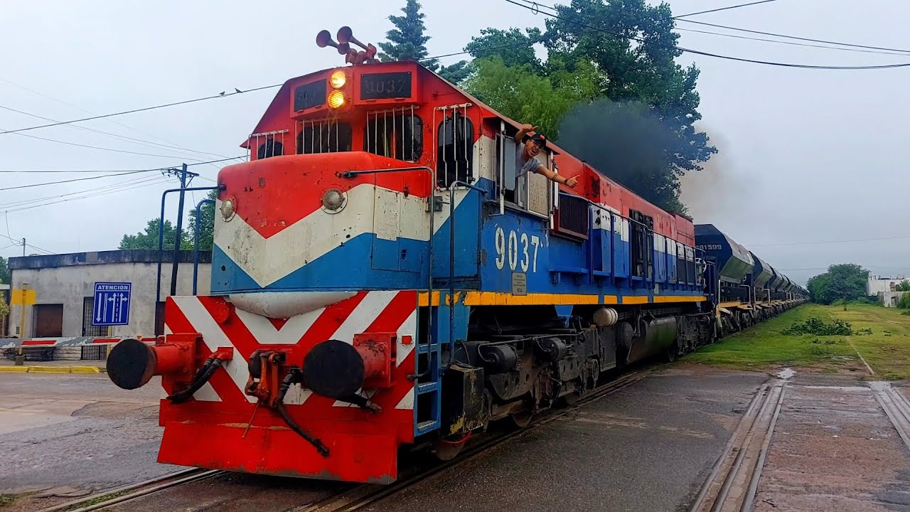 [4K] Variado y colorido tren cargado de NCA con la EMD GT-22CW 9037 pasando por Marcos Juárez ...