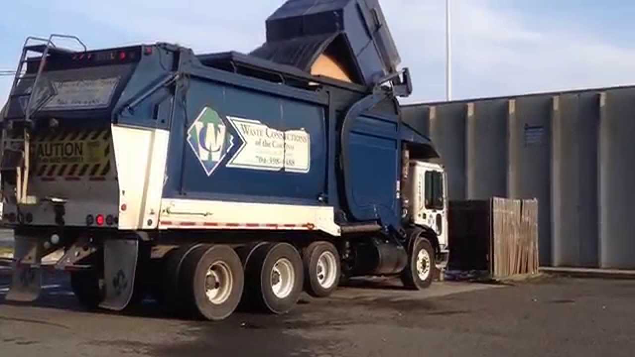 Waste Connections Mack MR688 Heil Half-Pack front loader - YouTube