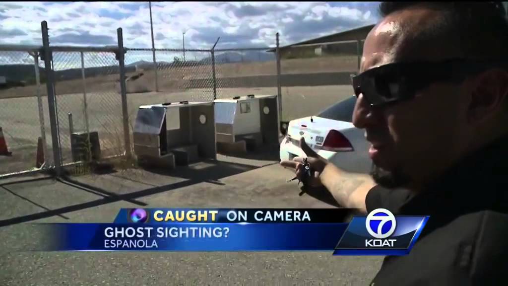 Ghost-like figure shows up on police station video - YouTube