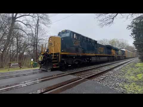 CSX M277 at Garrett Park, MD with a rebuilt CM44AC In the YN3B paint scheme leading. - YouTube