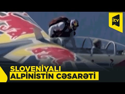 Uçan təyyarənin qanadlarına dırmandı, ilkə imza atdı