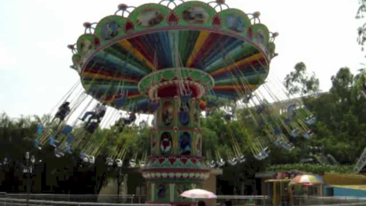 Crazy Swing Ride in China (旋转摇摆伞:求水山公园) - YouTube