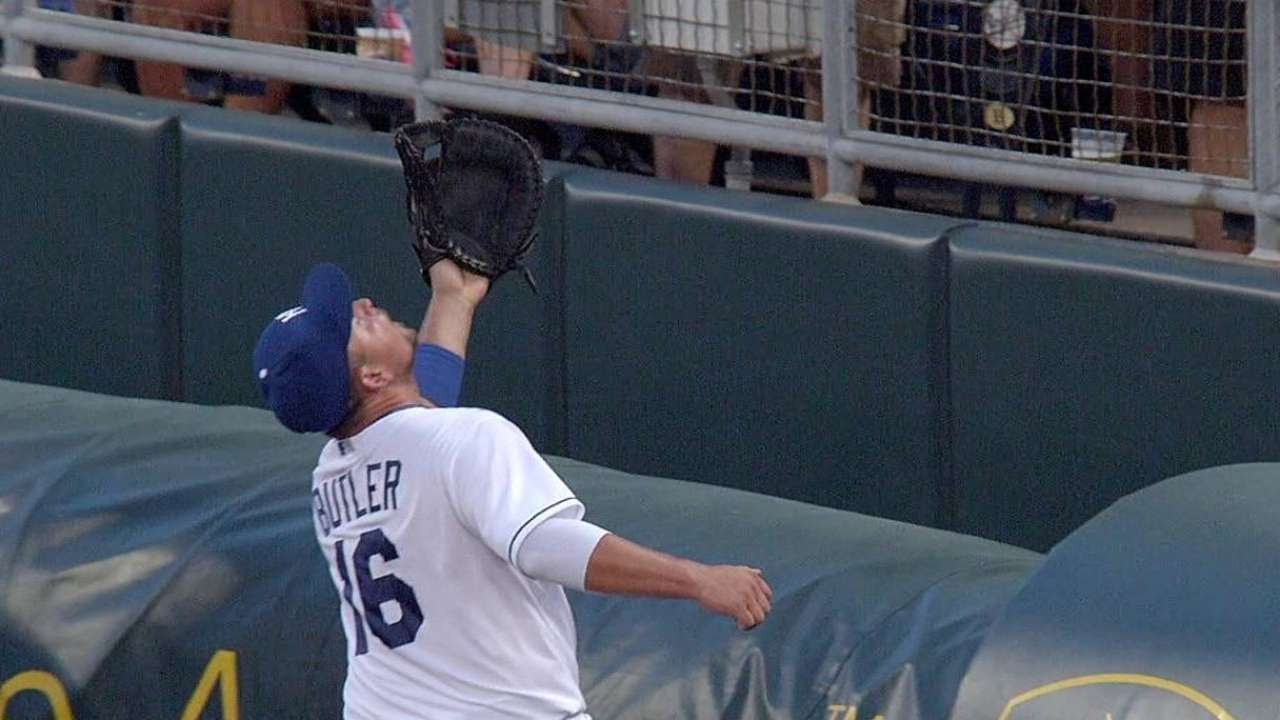 Butler trips over Colon while making a catch - YouTube