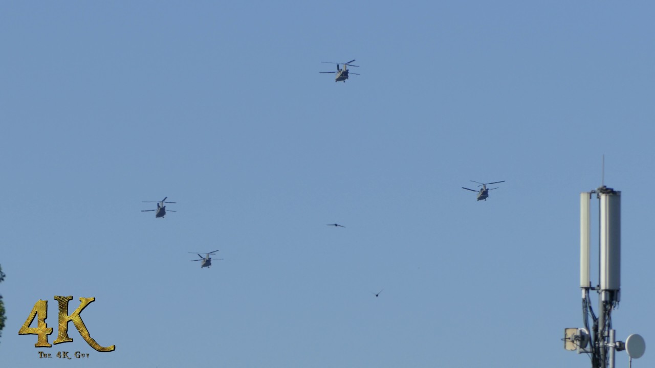 Impressive sight of four CH-47 Chinook helicopters flying in formation ...