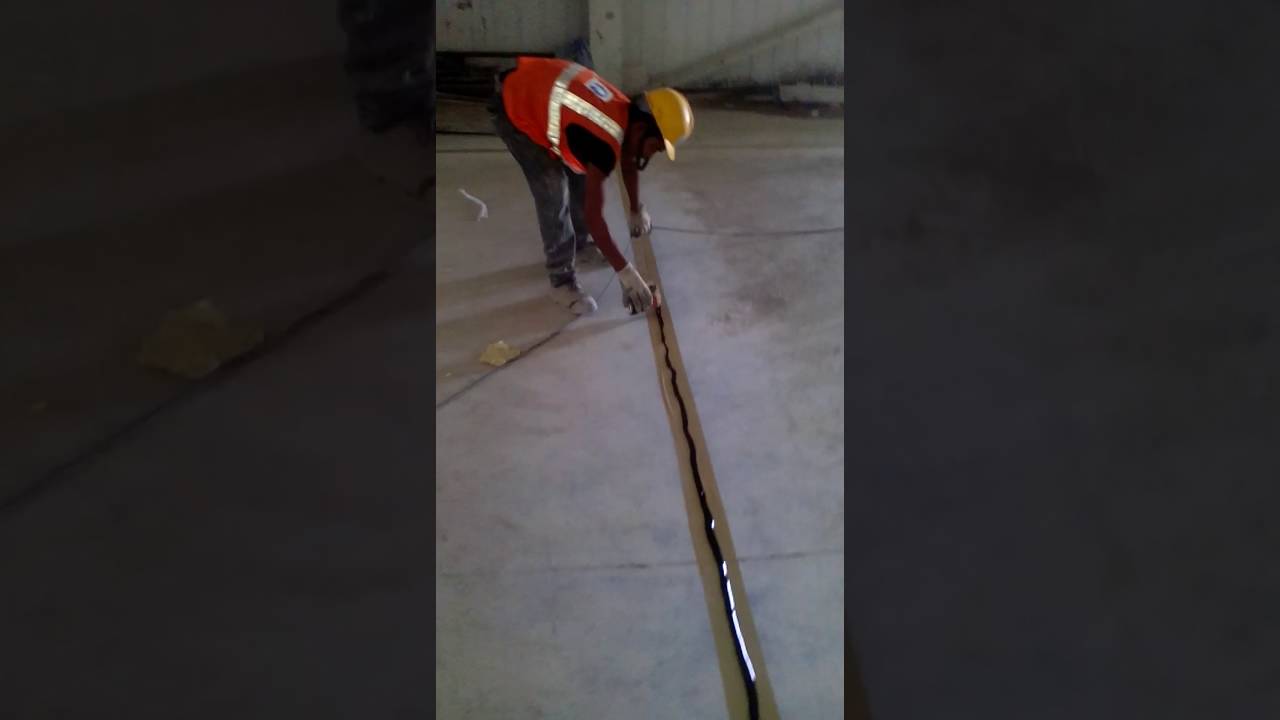 Groove filling in concrete floore - YouTube