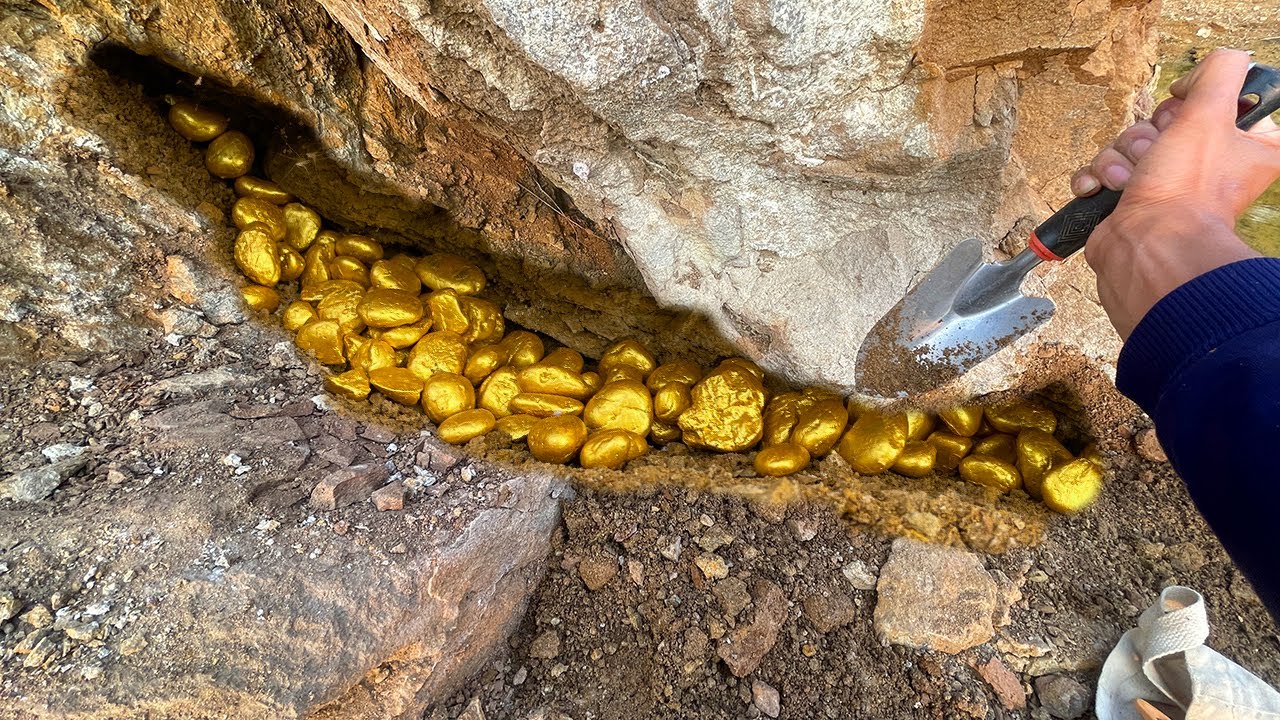 OMG! finding gold! a man found a lot of gold treasure under stone on ...
