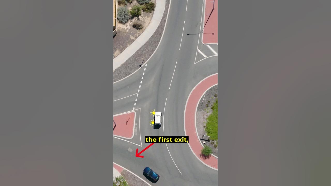 When to indicate on 2-lane roundabouts wnen driving straight through? - YouTube
