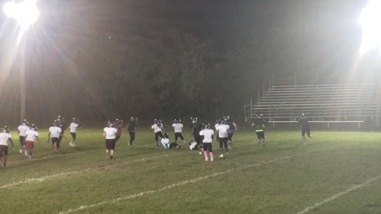 Kyree Davis 8U Football does the dead leg juke against 9U. Leaves two ...