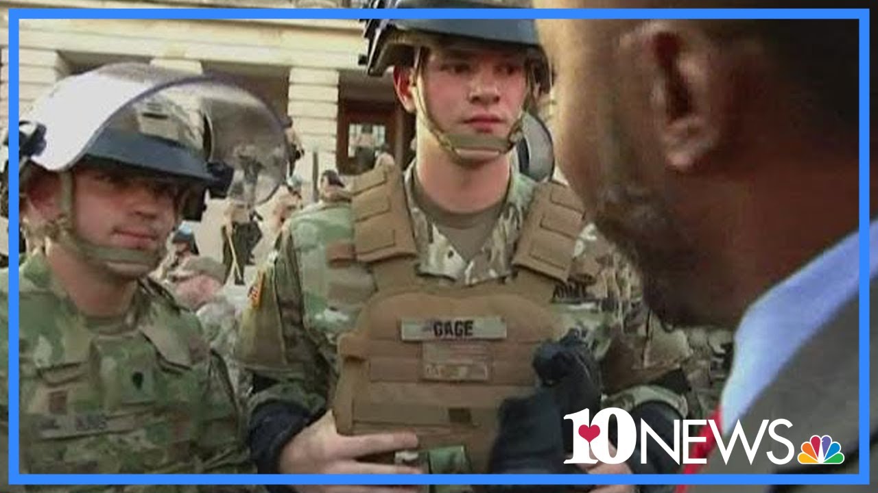 National guardsmen put down shields at rally - YouTube
