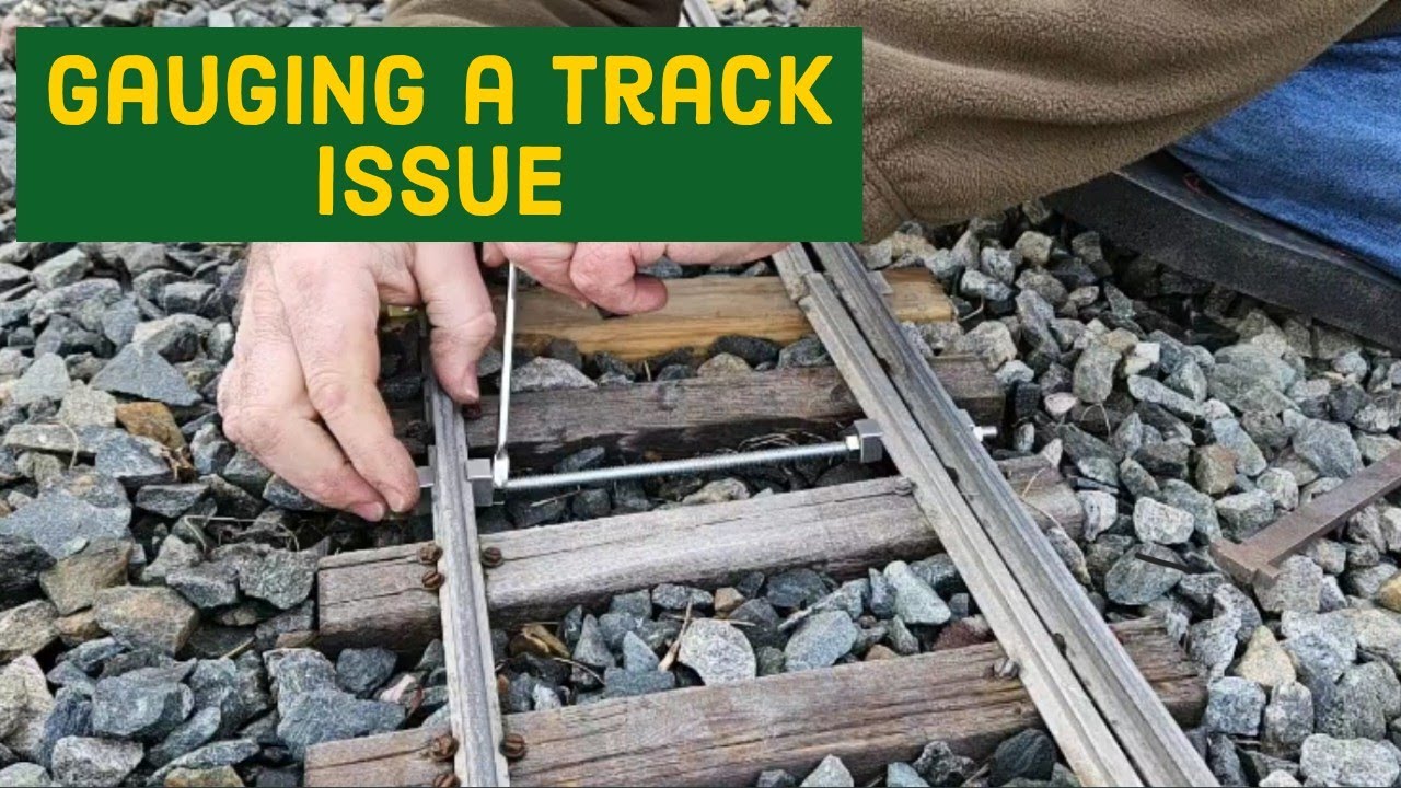 Installing Gauge Rods. So we don't derail. - YouTube