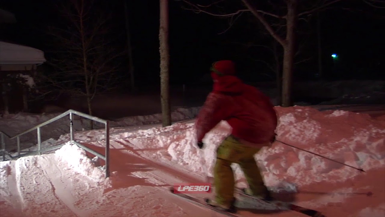 Two skiers nut shots at the same rail - YouTube