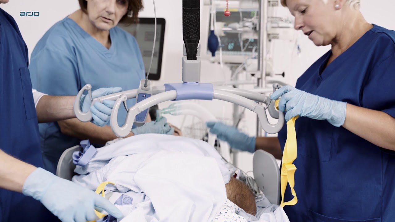 Lateral transfer using a Ceiling Lift with Maxi Transfer Sheet | Early ...