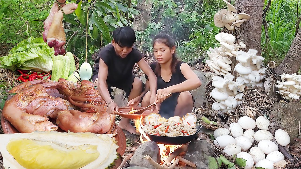 Cooking duck egg with Mushroom for jungle food, Dorian fruit and pork ...