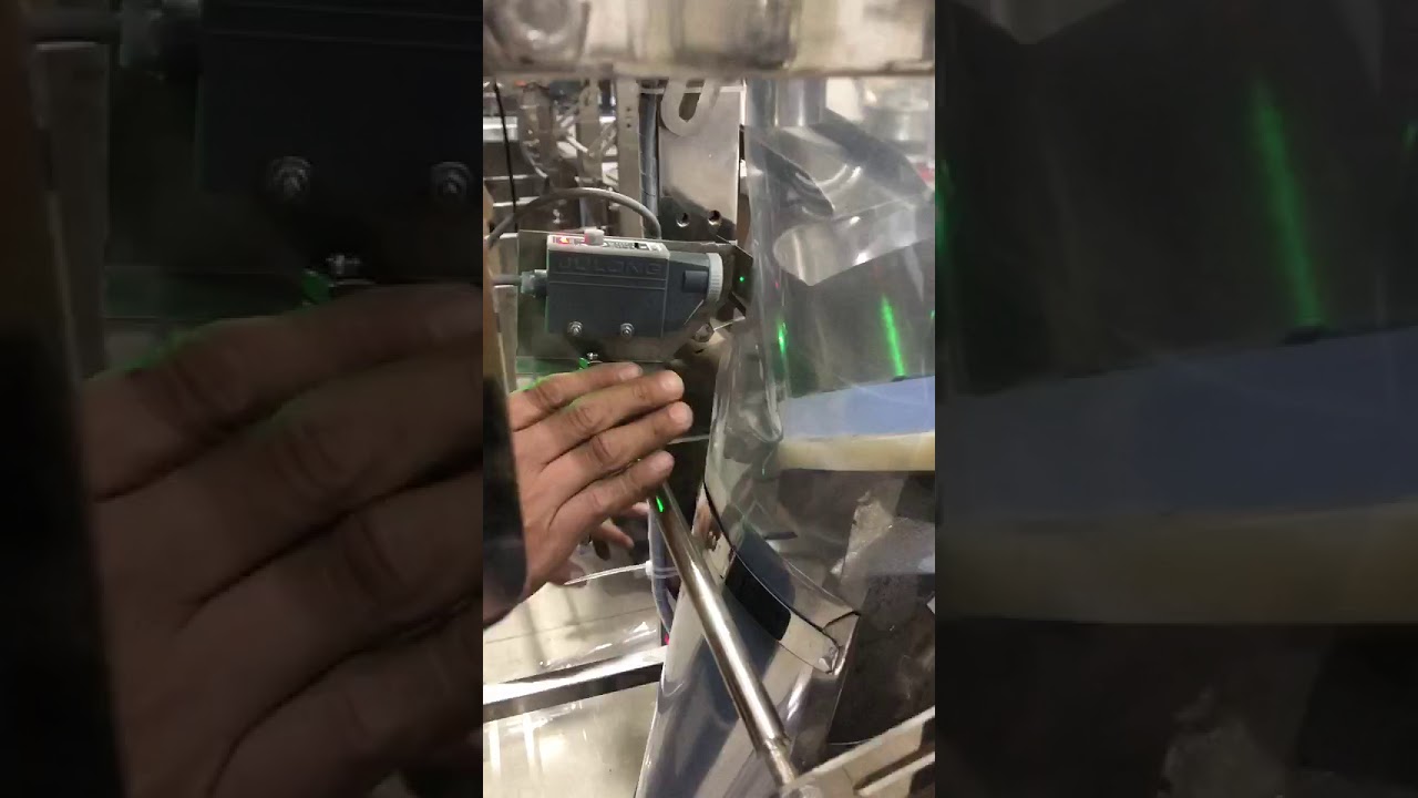 Film threading tutorial for tablet counting packaging machine - YouTube