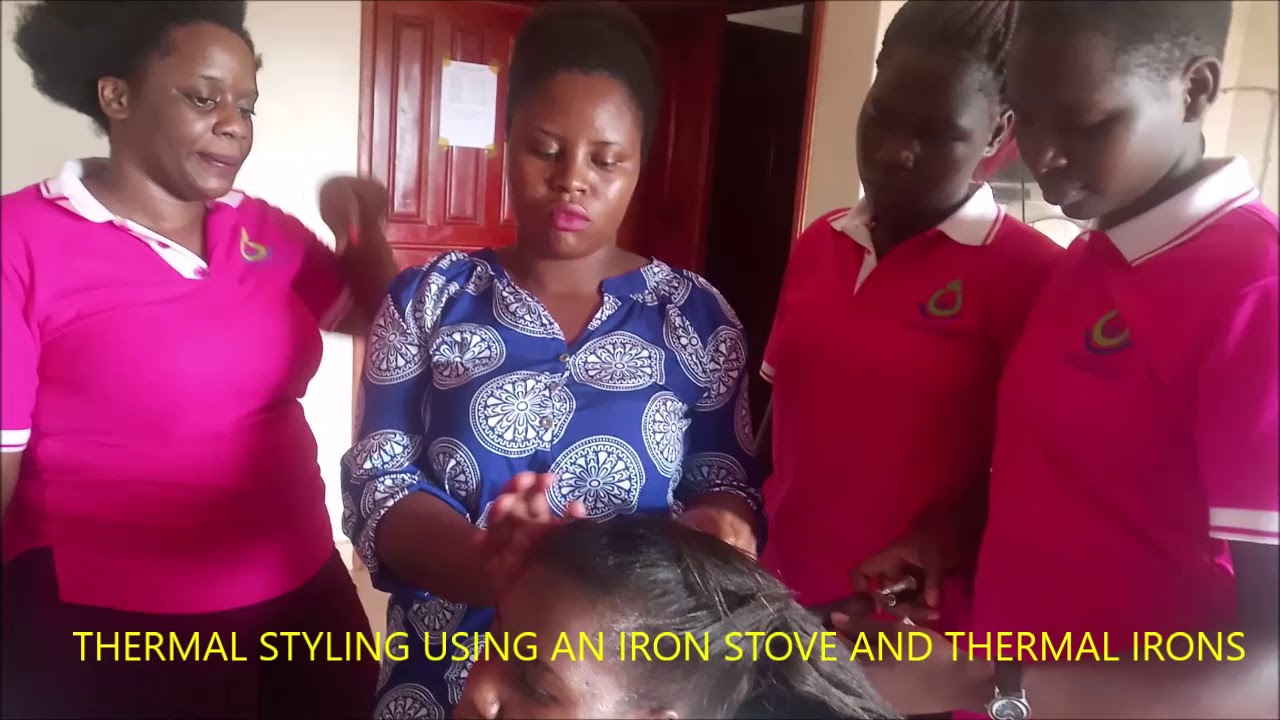 Thermal styling using an iron stove and thermal irons - PVC cosmetology ...