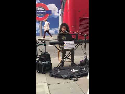 Harmonie London singing Adele Rolling in the Deep on London Oxford ...