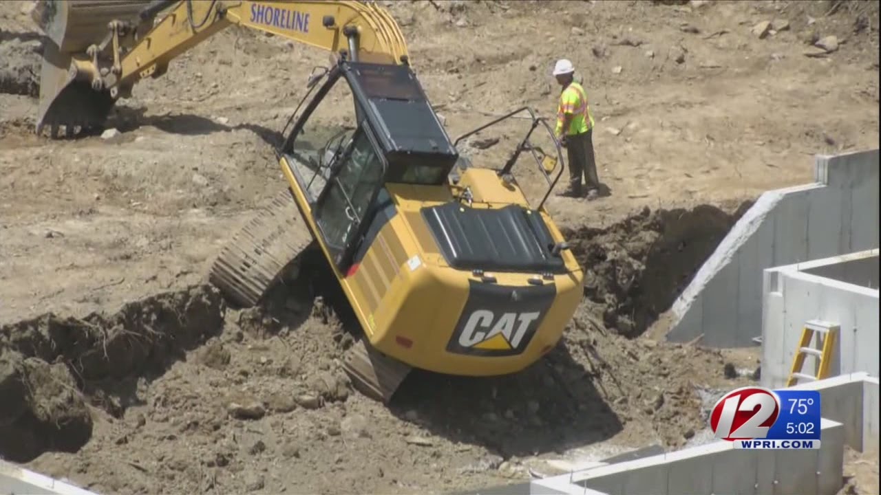 Crews Rescue Construction Worker Trapped Under Concrete - YouTube