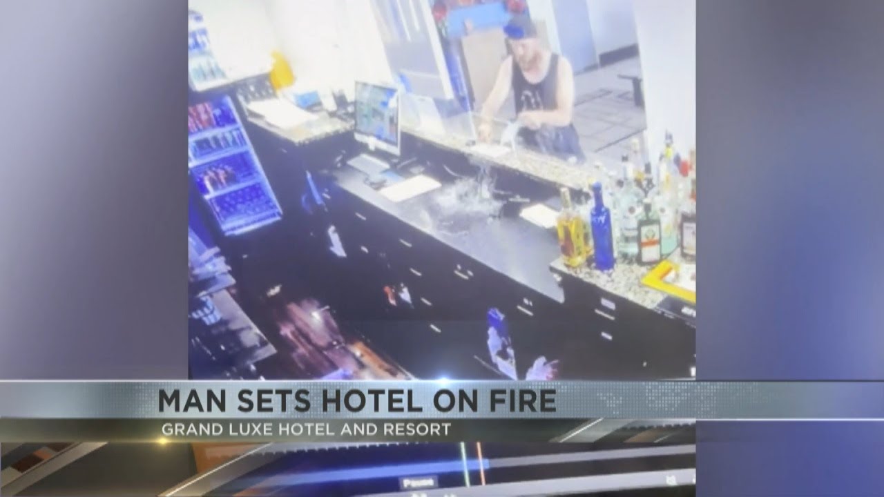 Man sets hotel reception desk on fire - YouTube