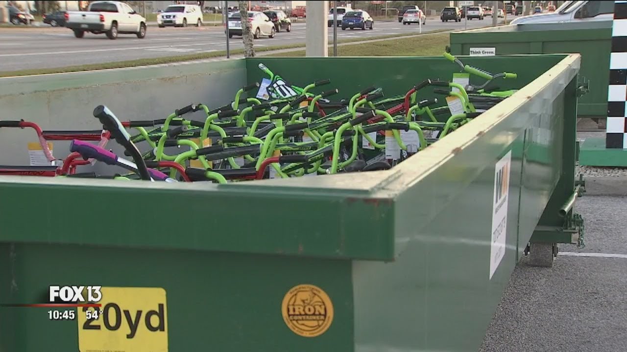 Garbage truck driver donates 107 bikes for kids in need - YouTube