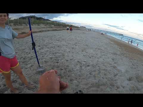 Epic coin spill metal detecting the beach! - YouTube