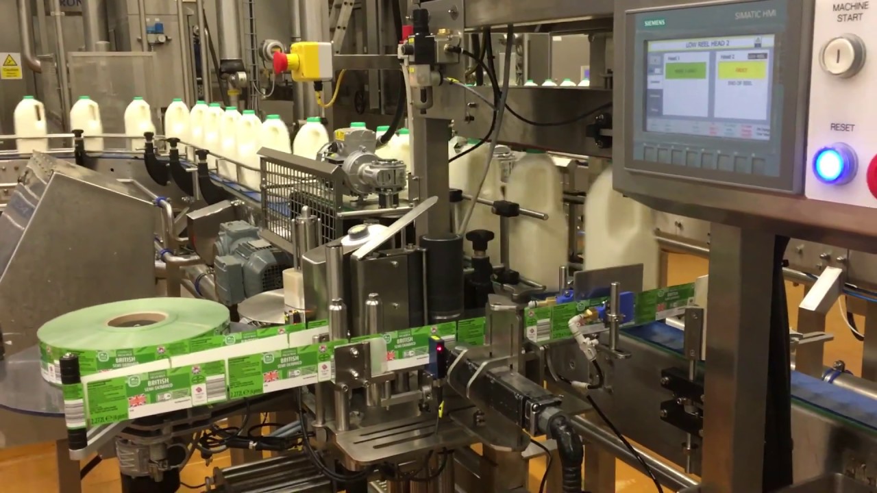 Sovereign Labelling Machines Milk Bottle Labeller - YouTube