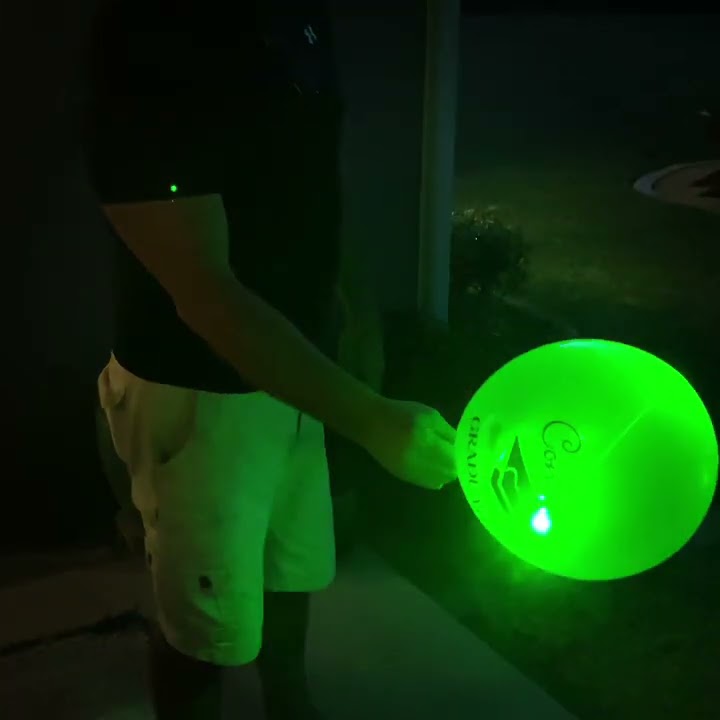 Popping balloon with green laser - YouTube