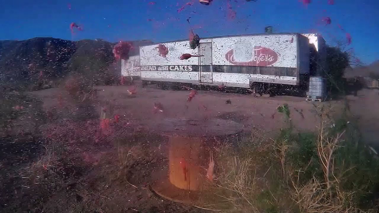 Slow Motion Bullet Impacts - YouTube