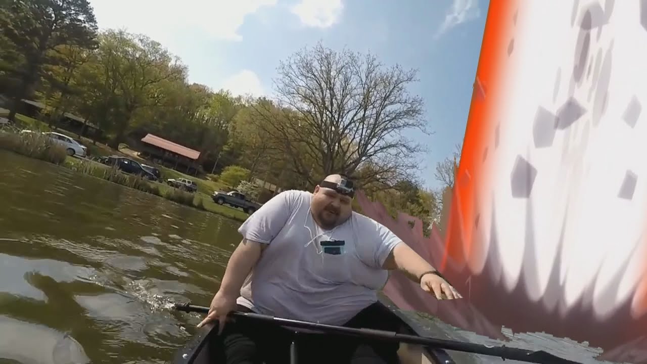 Fat guy falls off canoe but what made him fall ? - YouTube