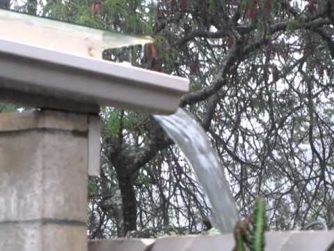 Waterfall....ok, it's really a gutter, but still ;) - YouTube