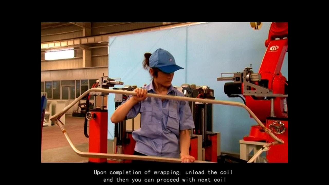 Coil Taping Machine with robot - YouTube