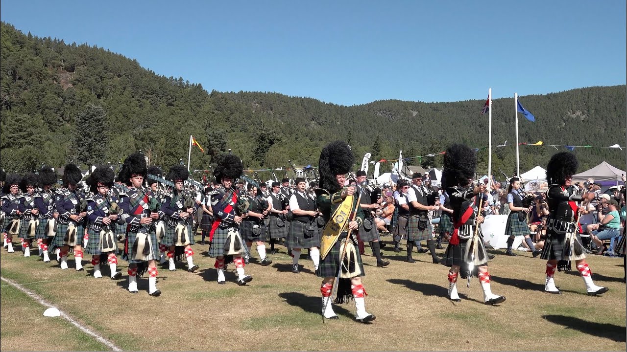 Massed Pipe Bands playing Scotland the Brave on the march during ...