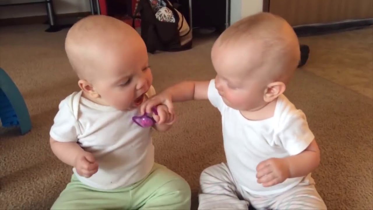 Twin baby girls fight over pacifier so cute♥️😍 - YouTube