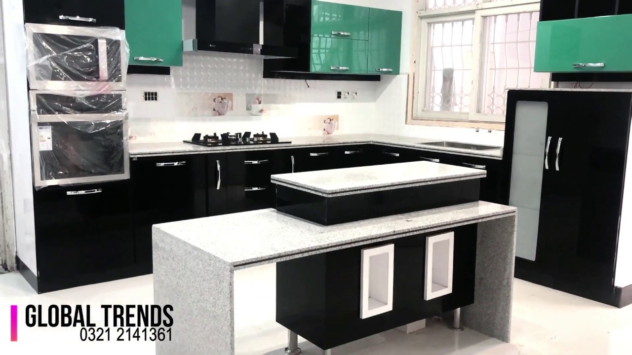 Latest Modular Tempered Glass Kitchen With A Gorgeous Blue & Black ...