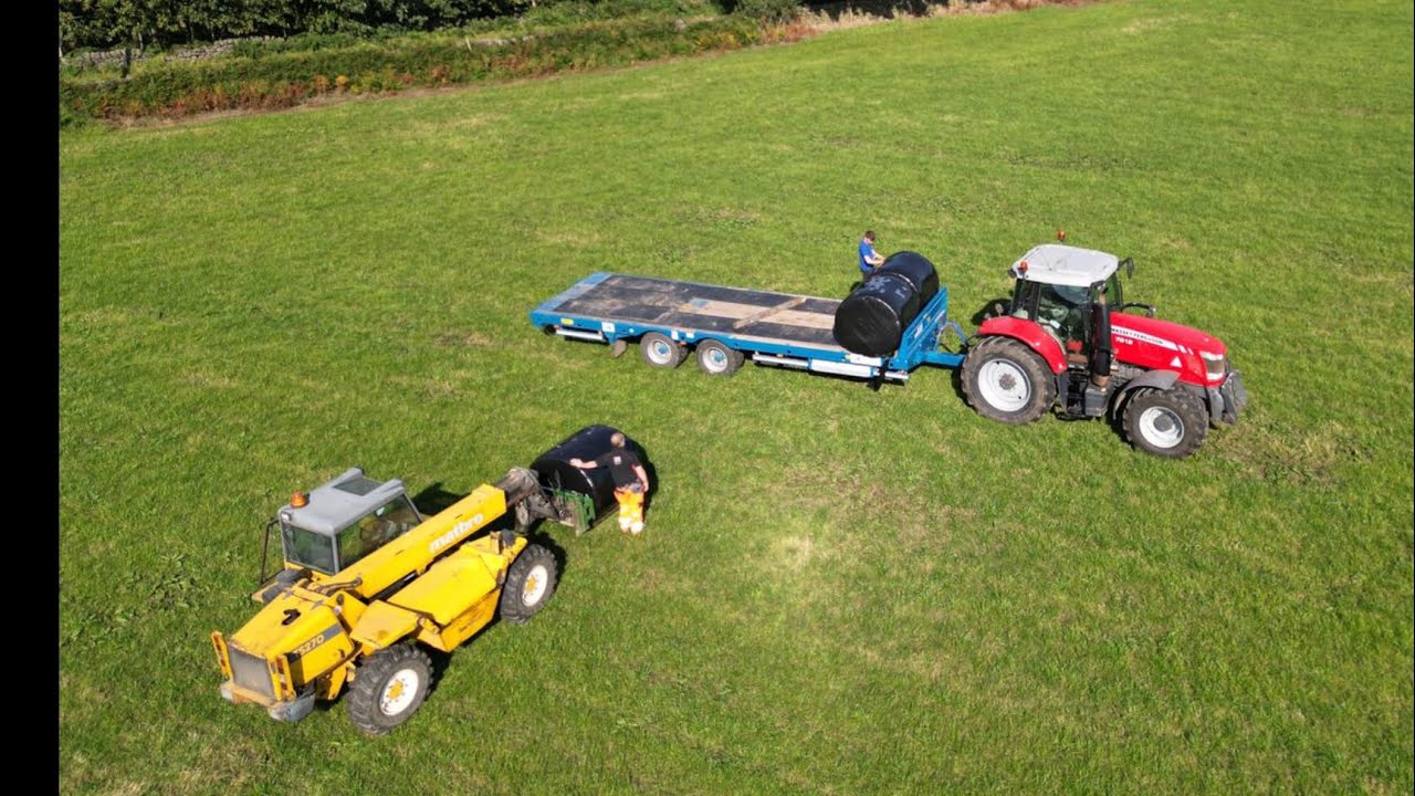 Moving round bales with Telehandler and Massey Ferguson tractor ...