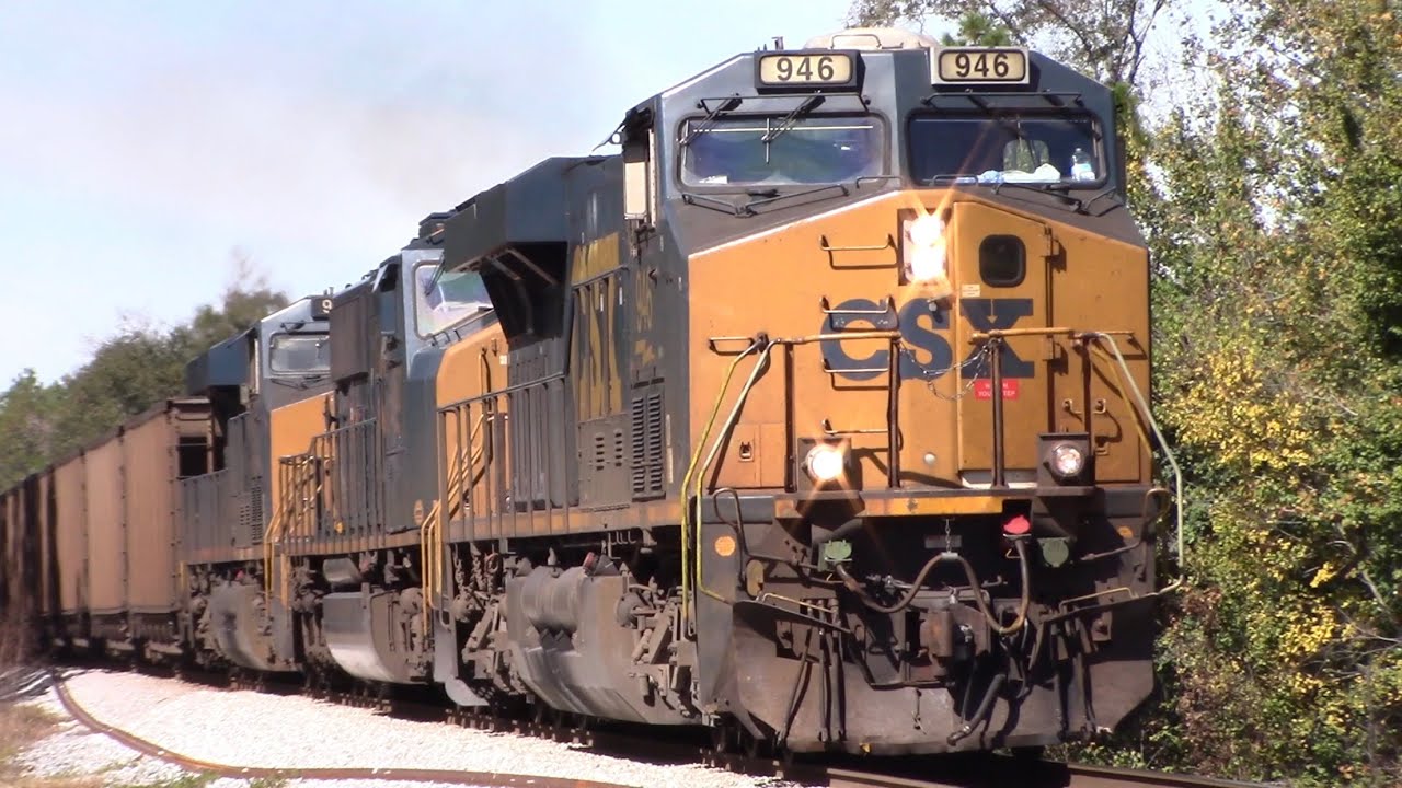 CSX 946 working hard leads combined loaded coal C040-09 up the grade in ...