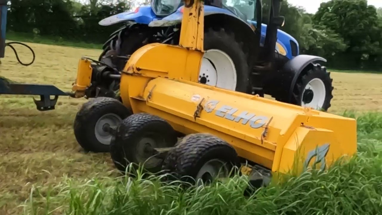 elho dc2100 double chop on a new Holland ts115a silage may 2022 - YouTube