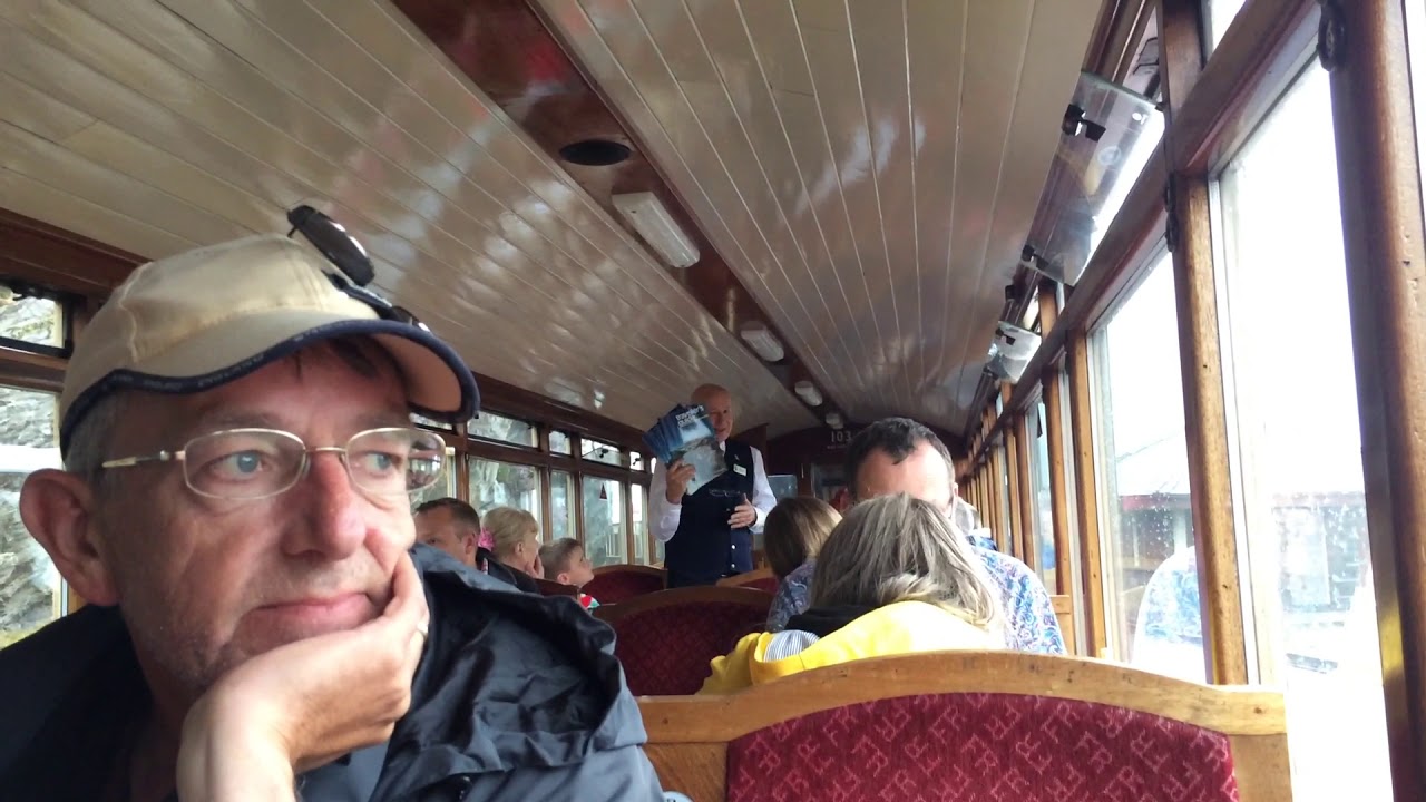 Entertaining steam train guard - YouTube