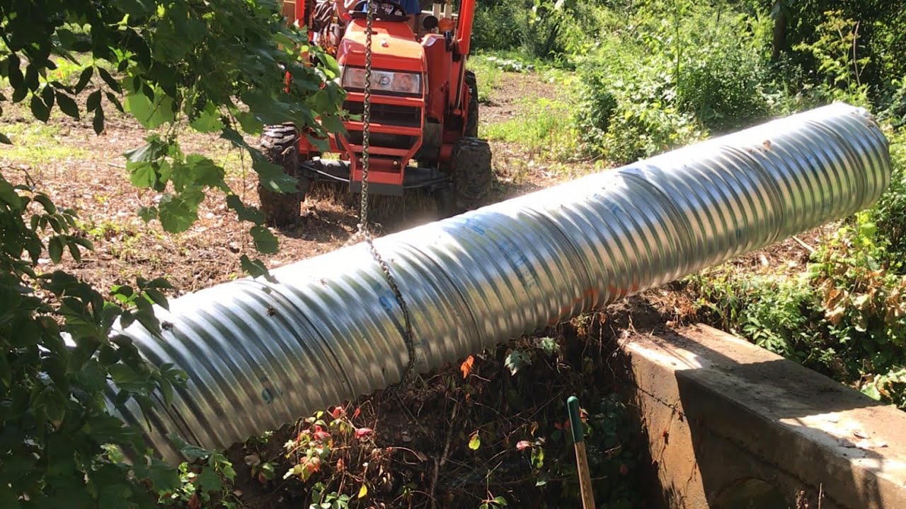 150 Installing a culvert to replace a bridge - YouTube