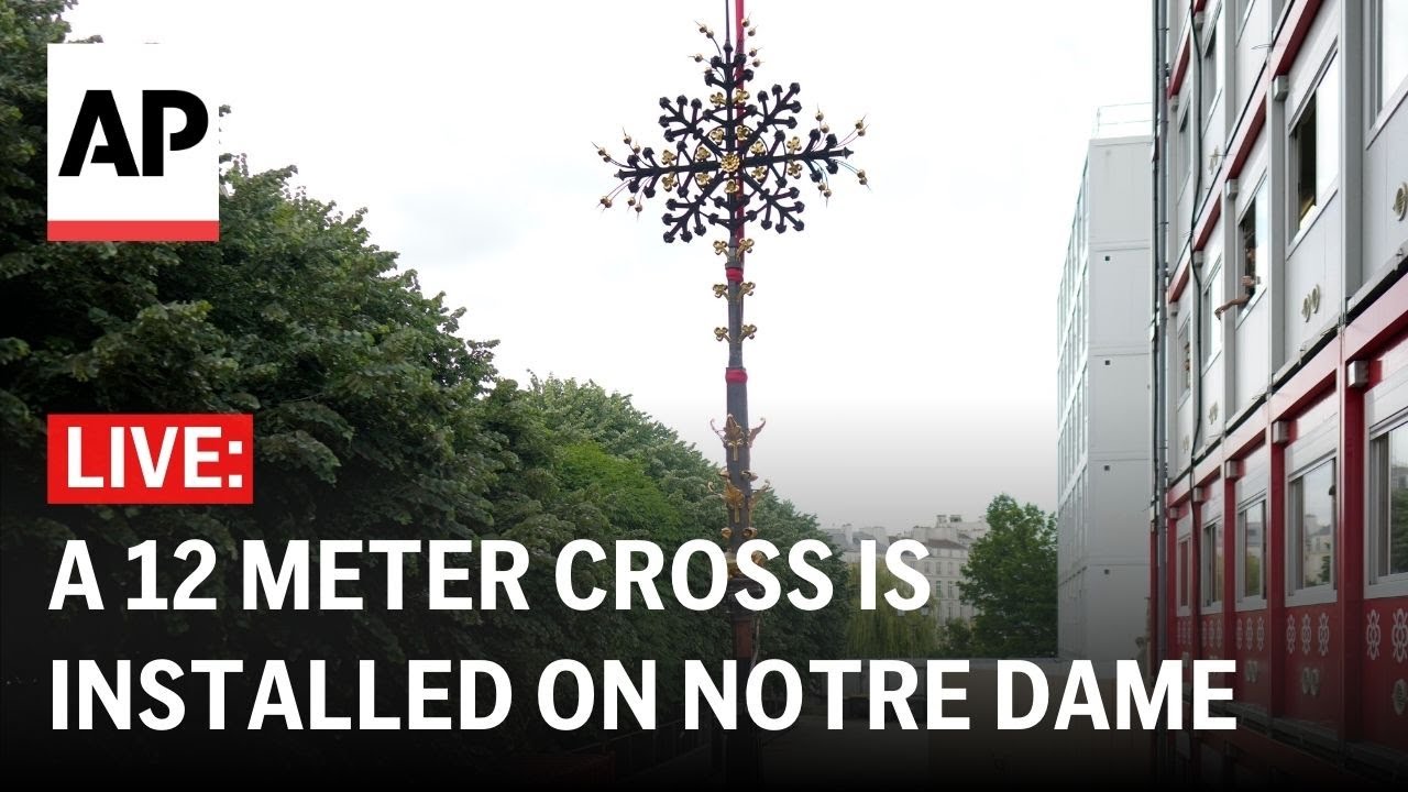 Notre Dame LIVE: A 12 meter cross is installed on the cathedral’s ...