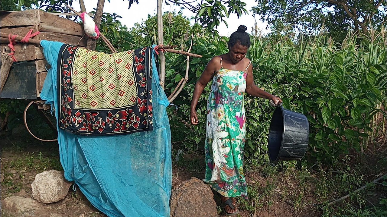 African village lifestyle|| Bathing in a village bathroom - YouTube