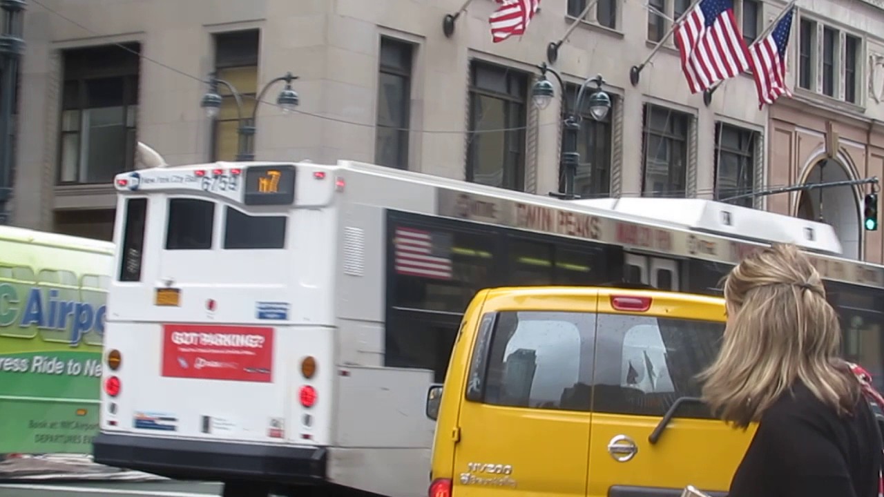 MTA 2007 Orion VII OG HEV # 6759 M7 Passing Penn Station - YouTube