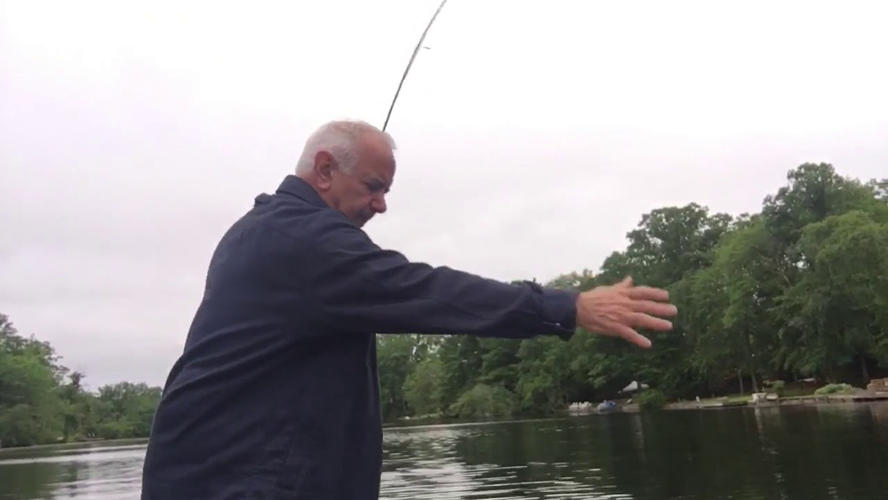 Dennis catches a fish! - YouTube