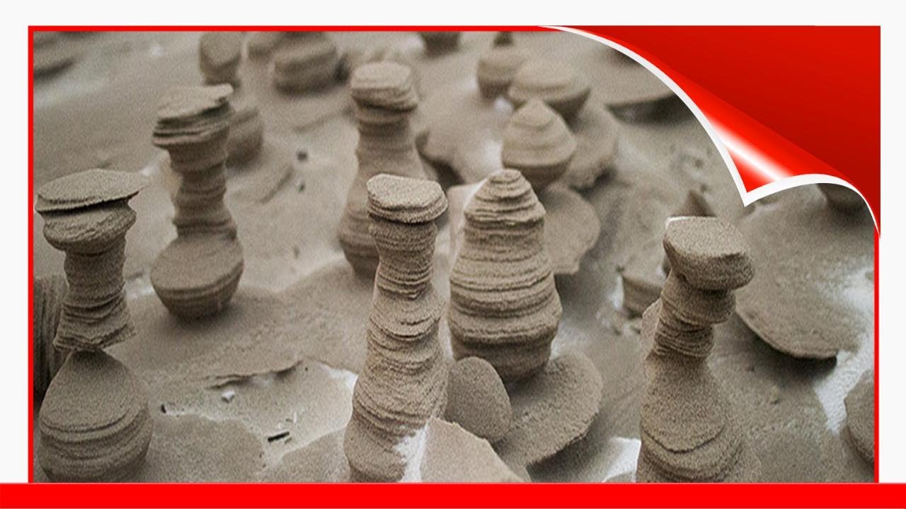 Wind Turns Frozen Sand Into Alien Towers On Lake Michigan Shore 🙃 - YouTube