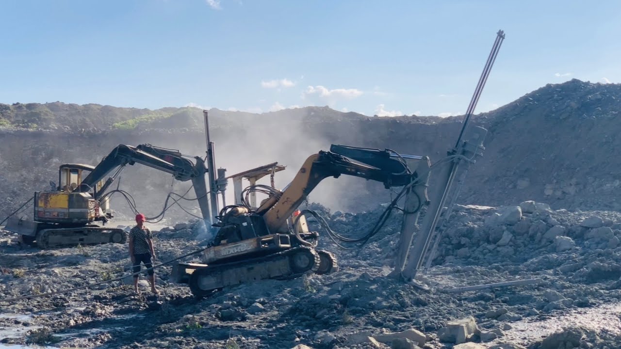 Blasting rock drilling activities in the pit - YouTube