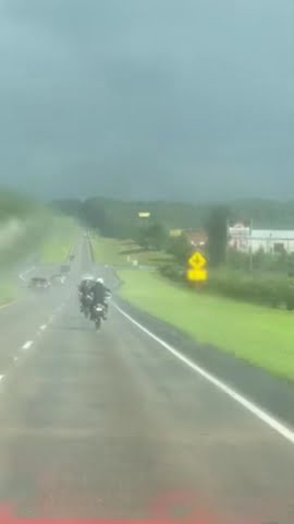 Riding dirt bikes through heavy rain - YouTube