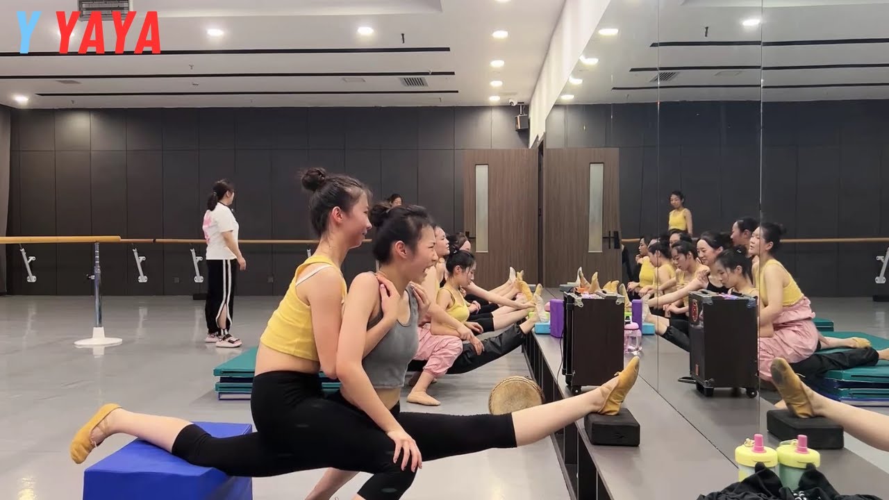 Real scene of thigh flexibility training in dance class - each one is a ...