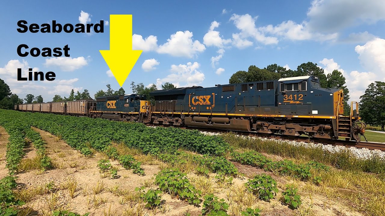 Ex-SCL SD40-2, Trinity Rapid Discharge Hoppers on CSX Coal N040 - YouTube