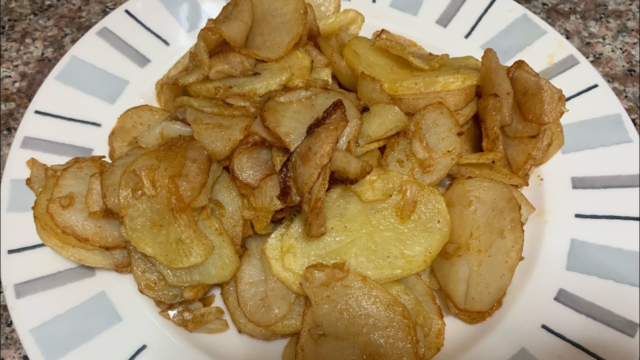 Arabic Fried potato with spices/ VegetarianFood / batata harra بطاطا ...