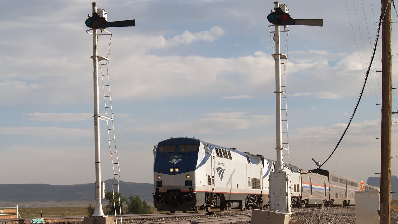 Amtrak 3 heading past West Levy Siding semaphore signals. - YouTube