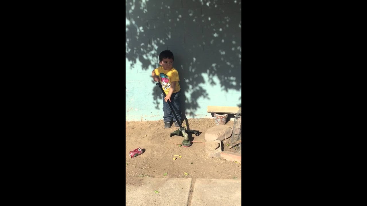 Little boy with the weed eater trimming sound effects - YouTube